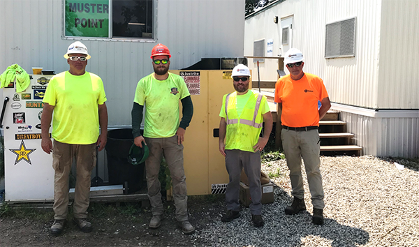 Leading with Safety - Orange Hard Hat | Methuen Construction